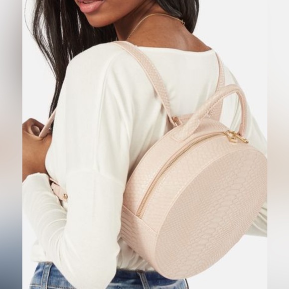 JustFab | Bags | Justfab Circle Backpack Blush Snake | Poshmark